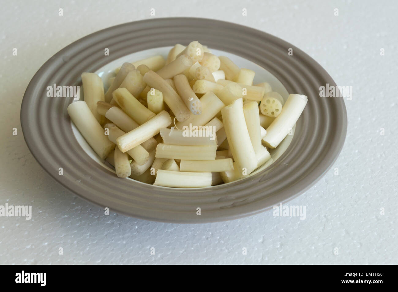 lotus root stalk plant food preparation eat Stock Photo - Alamy