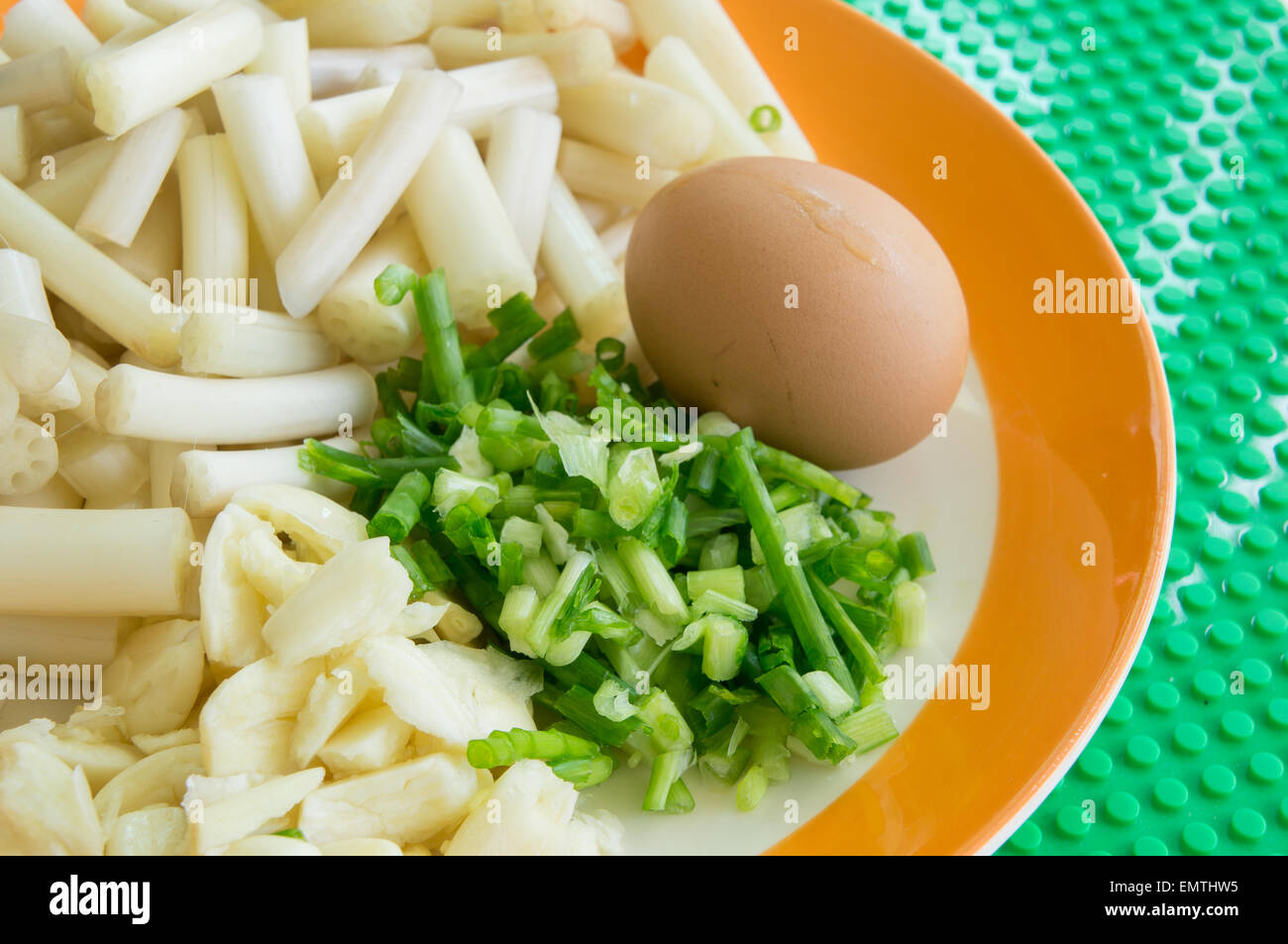 lotus root stalk plant food preparation eat Stock Photo - Alamy
