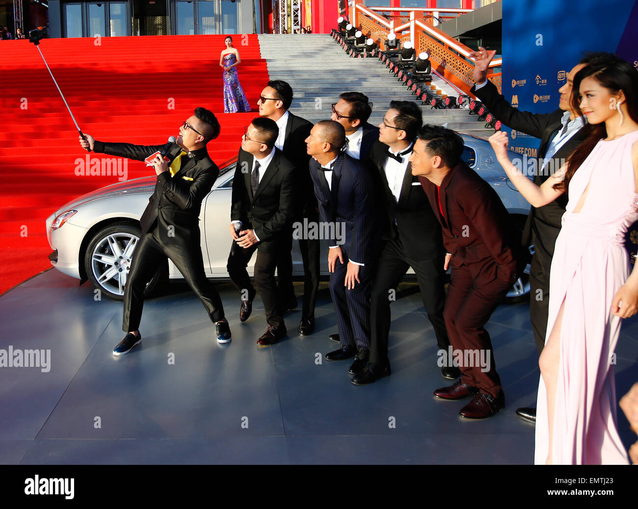 Beijing, China. 23rd Apr, 2015. Host Cao Yang (1st L) and cast members ...