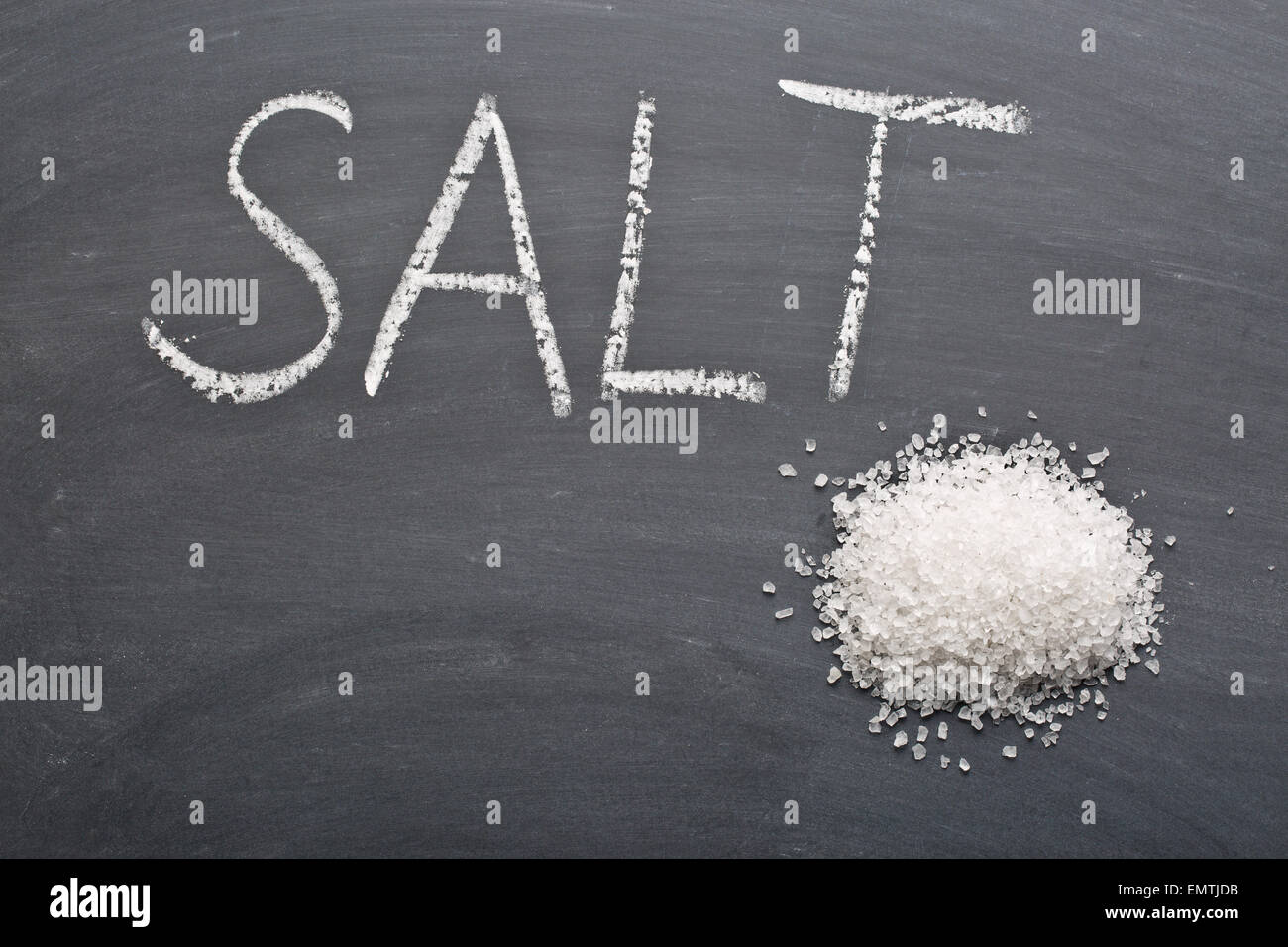 the white salt on chalkboard Stock Photo - Alamy