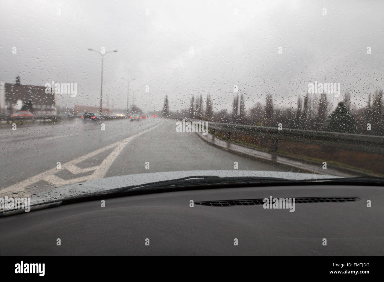 Bad weather conditions driving car Stock Photo - Alamy