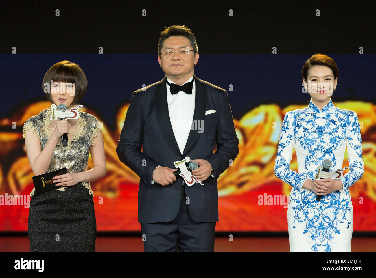 Beijing, China. 23rd Apr, 2015. Host Zhang Bin (C), hostess Jiang ...