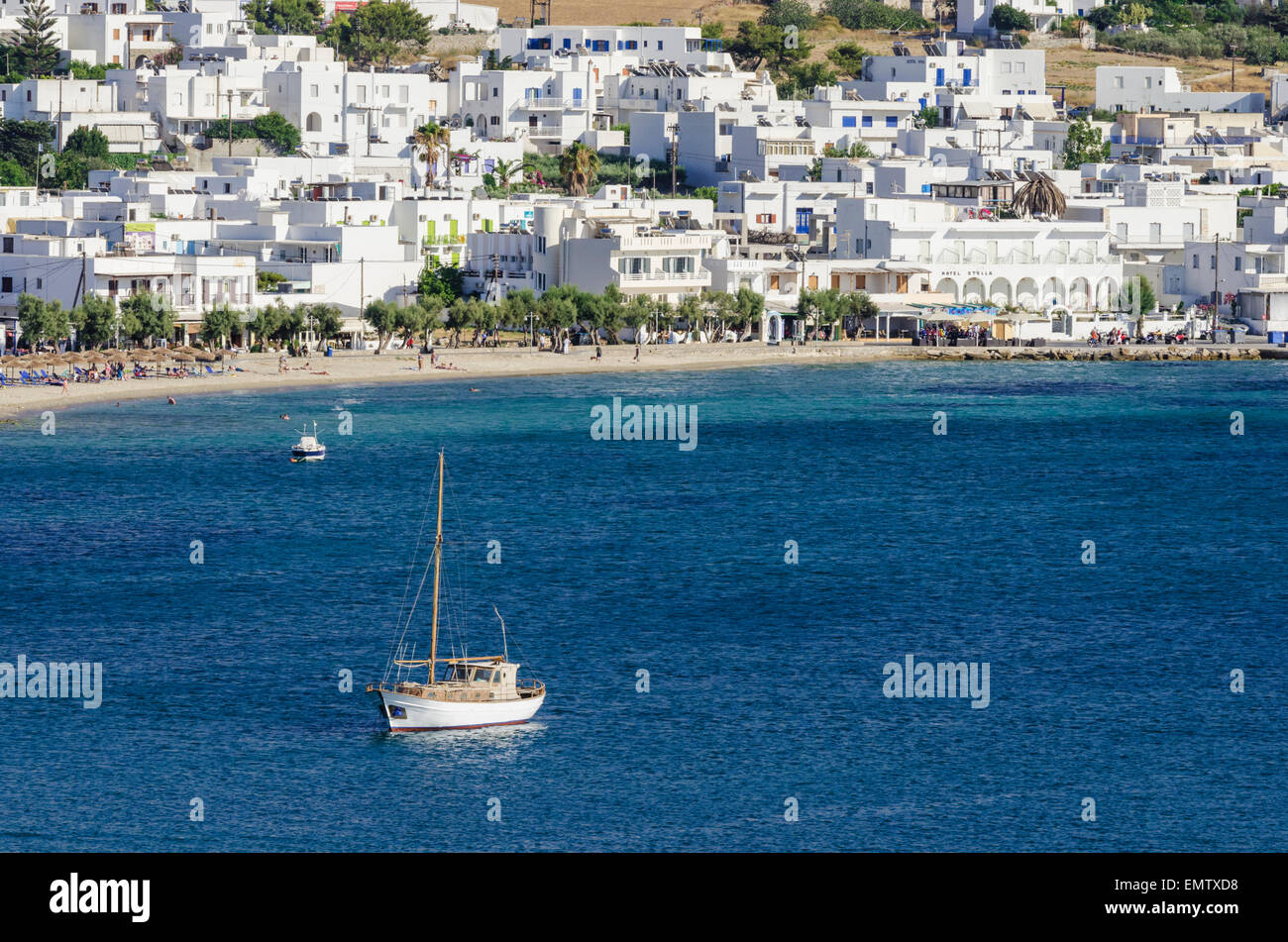 Small traditional masted boat in Parikia Bay, Paros, Greece Stock Photo ...