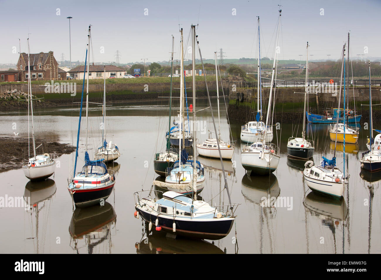 UK, Cumbria, Workington, leisure boats moored in historic old harbour ...