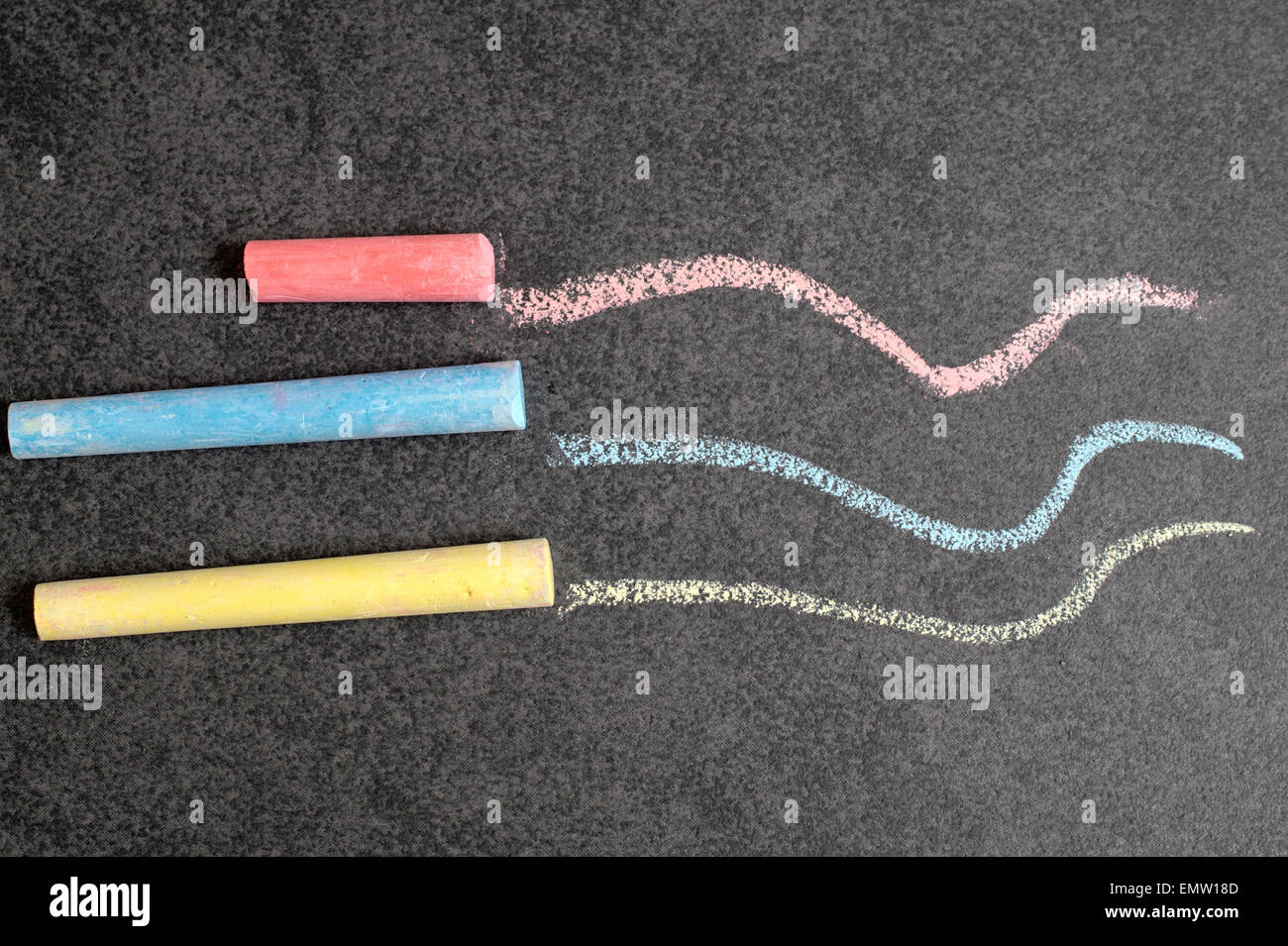 Colored chalk on a blackboard background, from above Stock Photo - Alamy