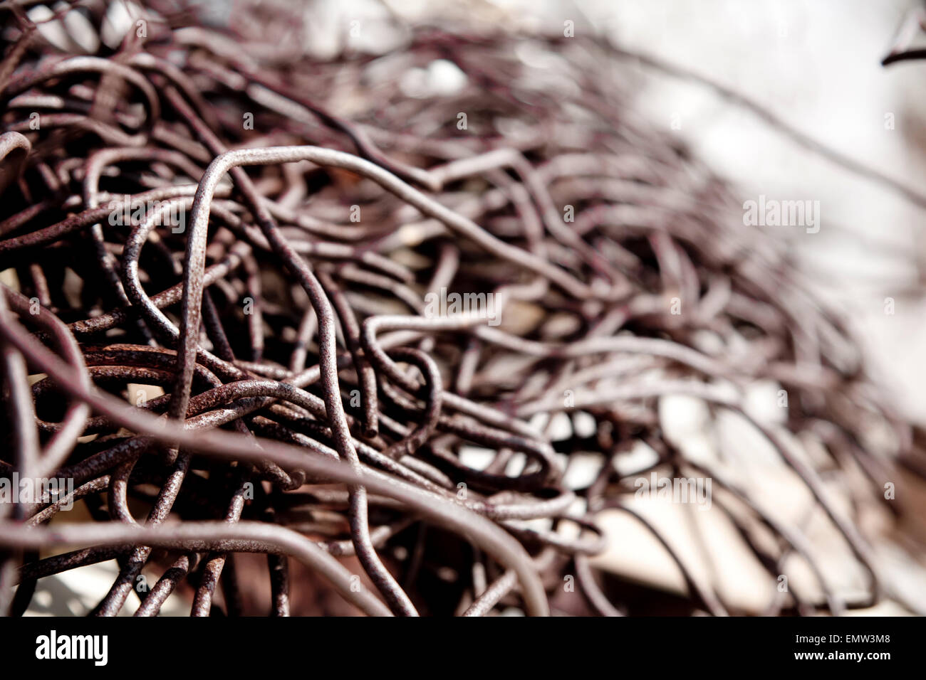 A bundle of used copper wire left in the sun in the desert Stock Photo ...