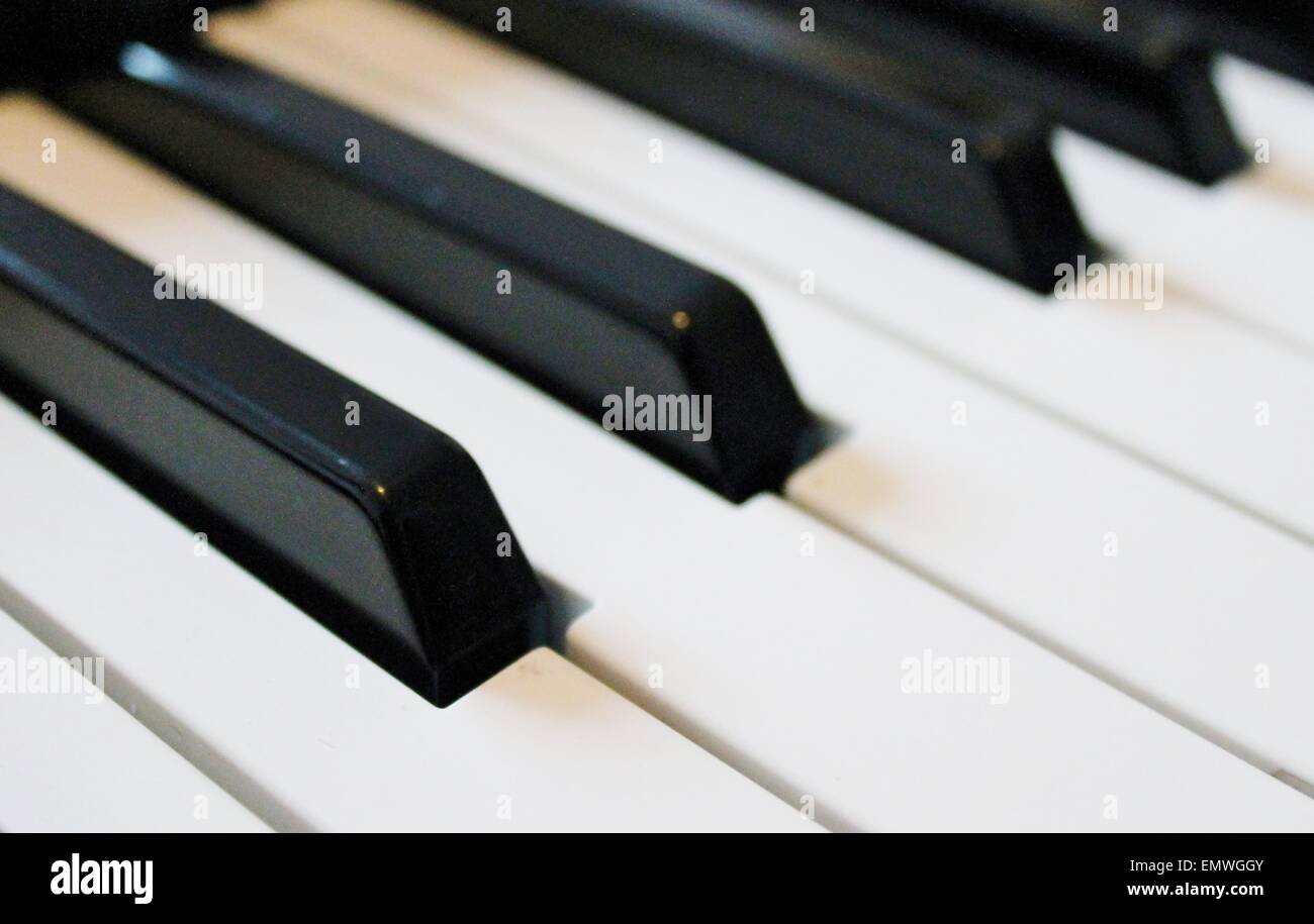 piano keys black and white instrument Stock Photo - Alamy