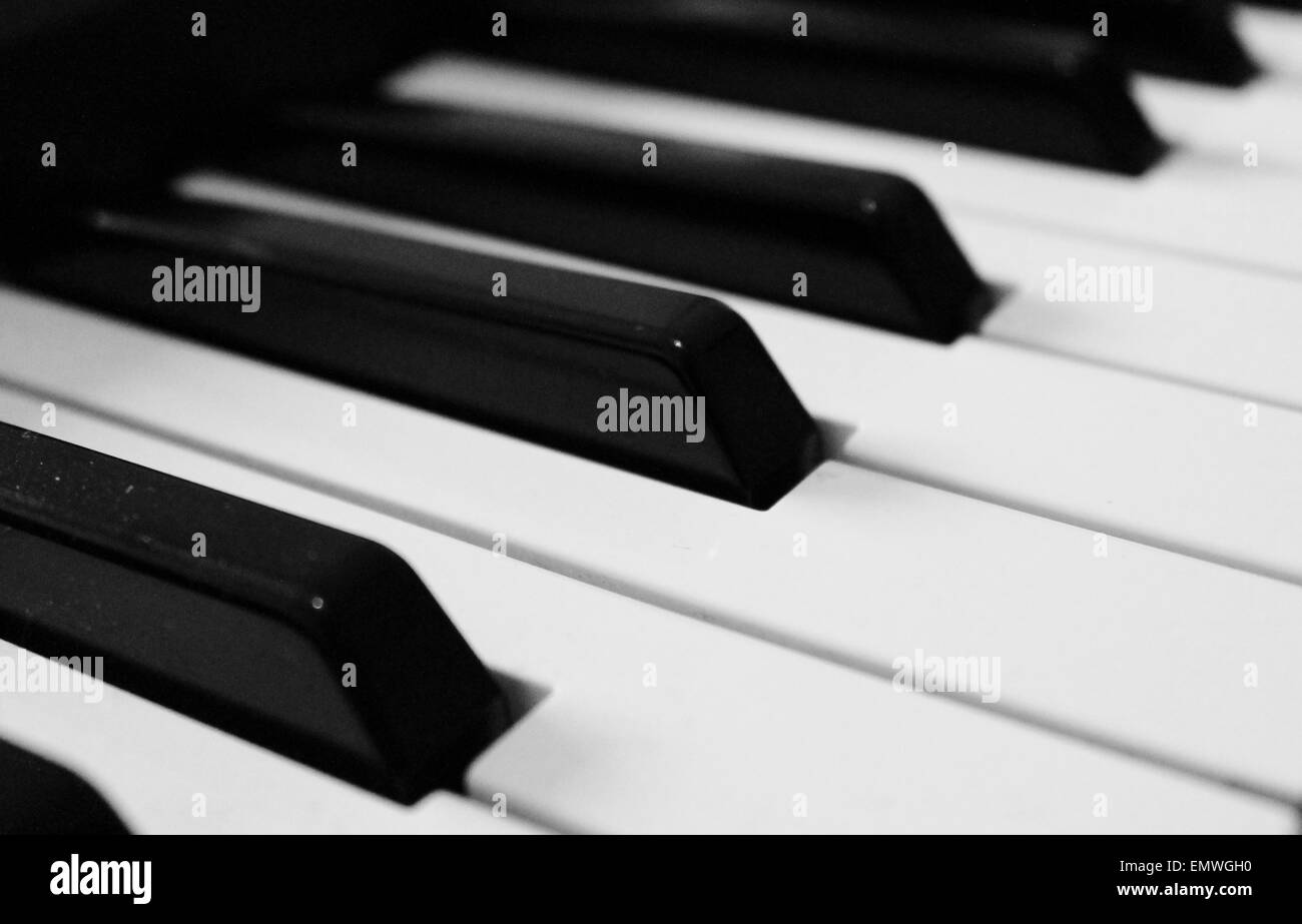 piano keys black and white instrument Stock Photo - Alamy