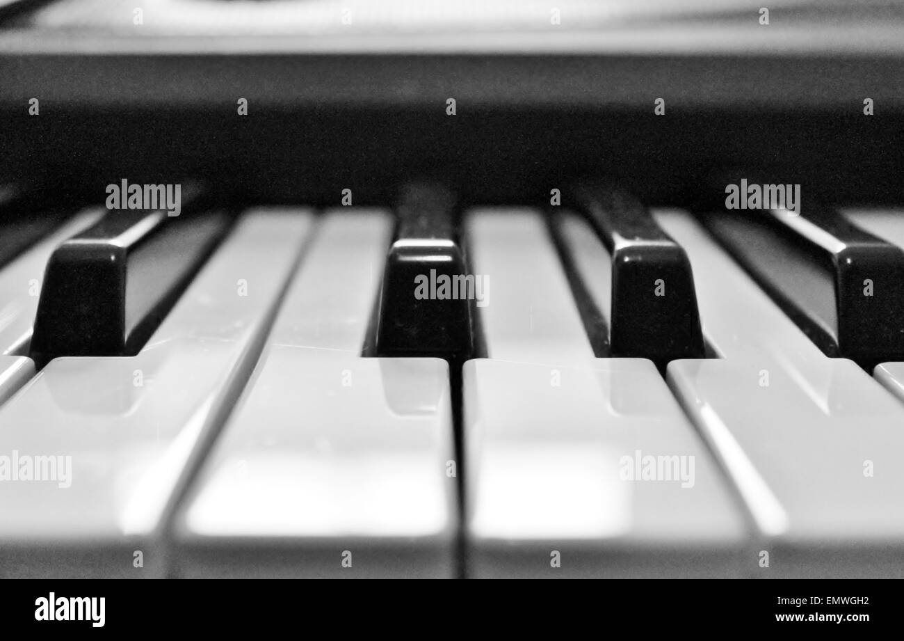 piano keys black and white instrument Stock Photo - Alamy