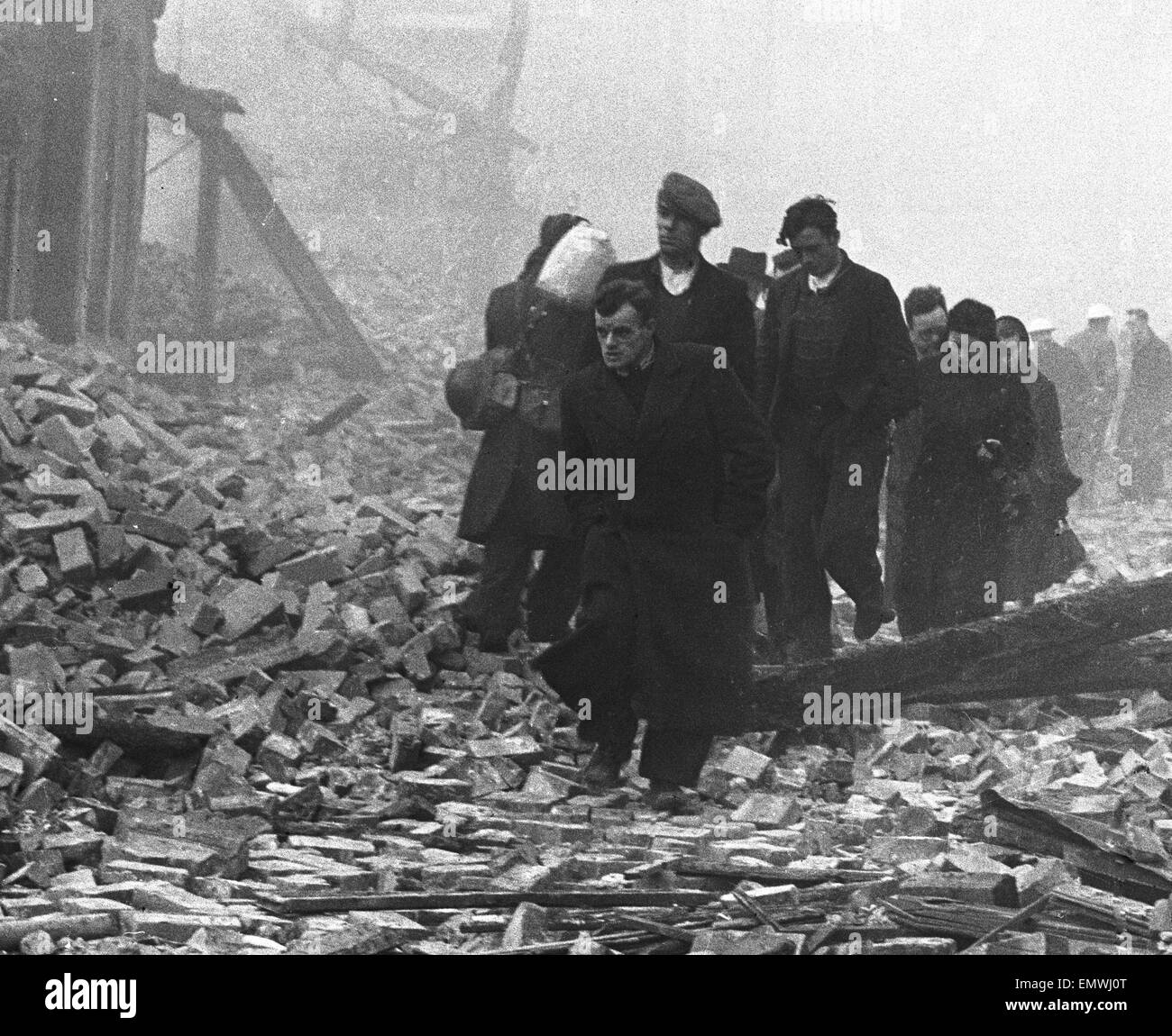 The city of Coventry shrouded in a cloak of smoke and drizzle as people ...