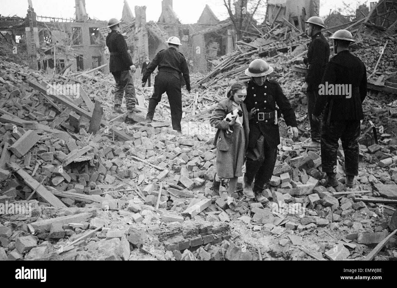 Firemen helping a girl from the rubble Stock Photo - Alamy