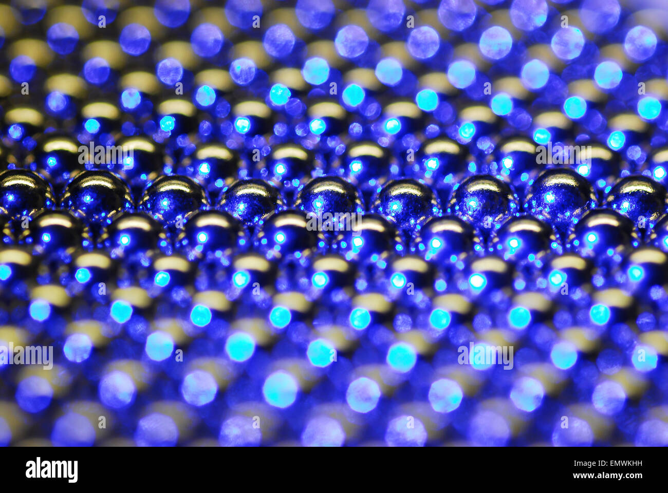 Tiny Magnets lit by LED lights Closeup Stock Photo - Alamy