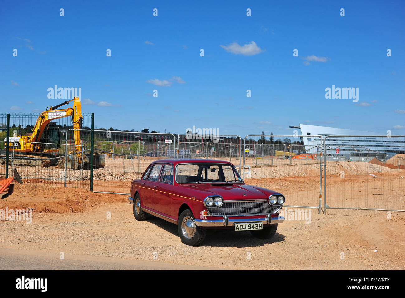 A classic Austin 3 litre parked in front of the former British Leyland ...