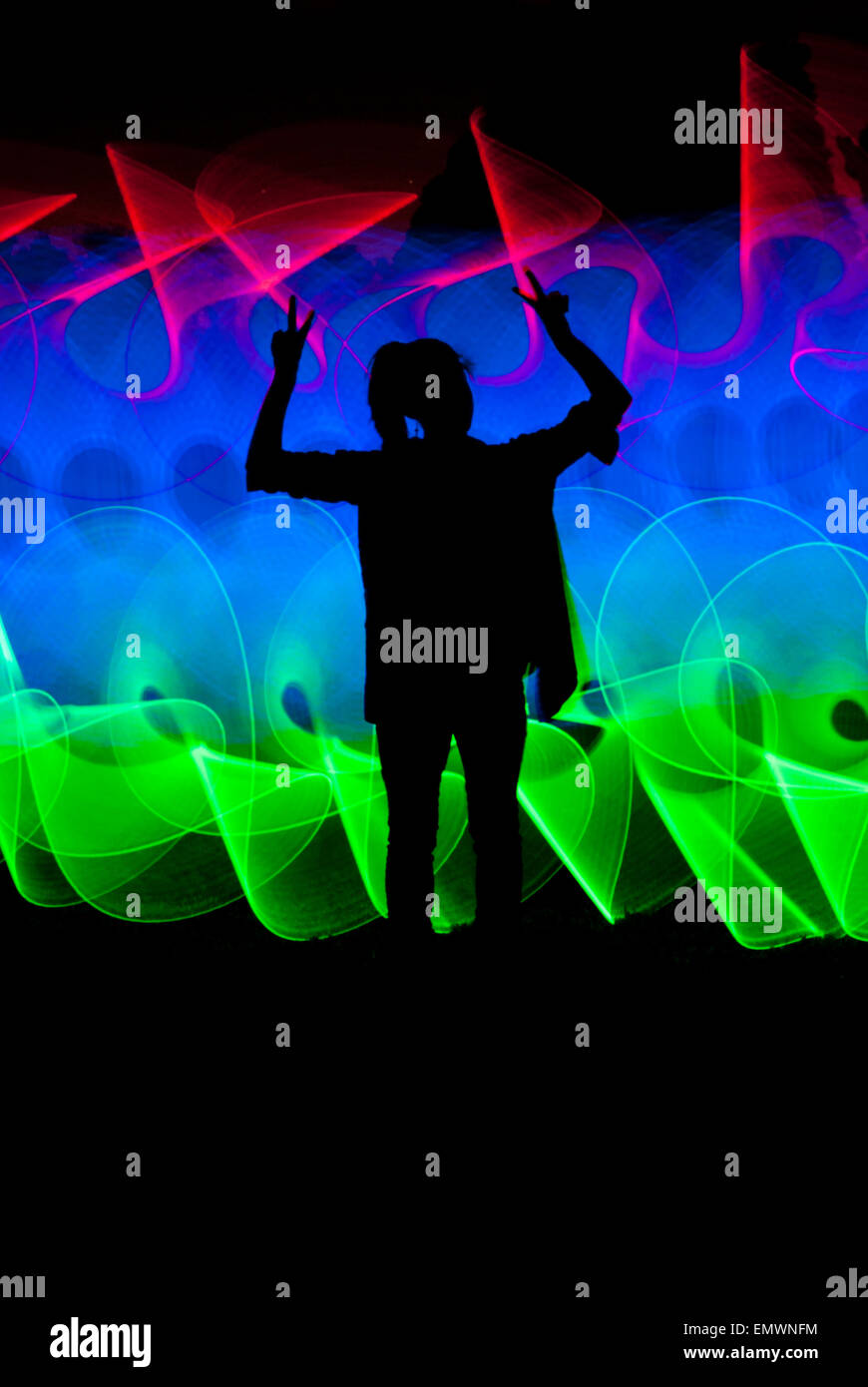Silhouette girl dancing light painting hi-res stock photography and ...