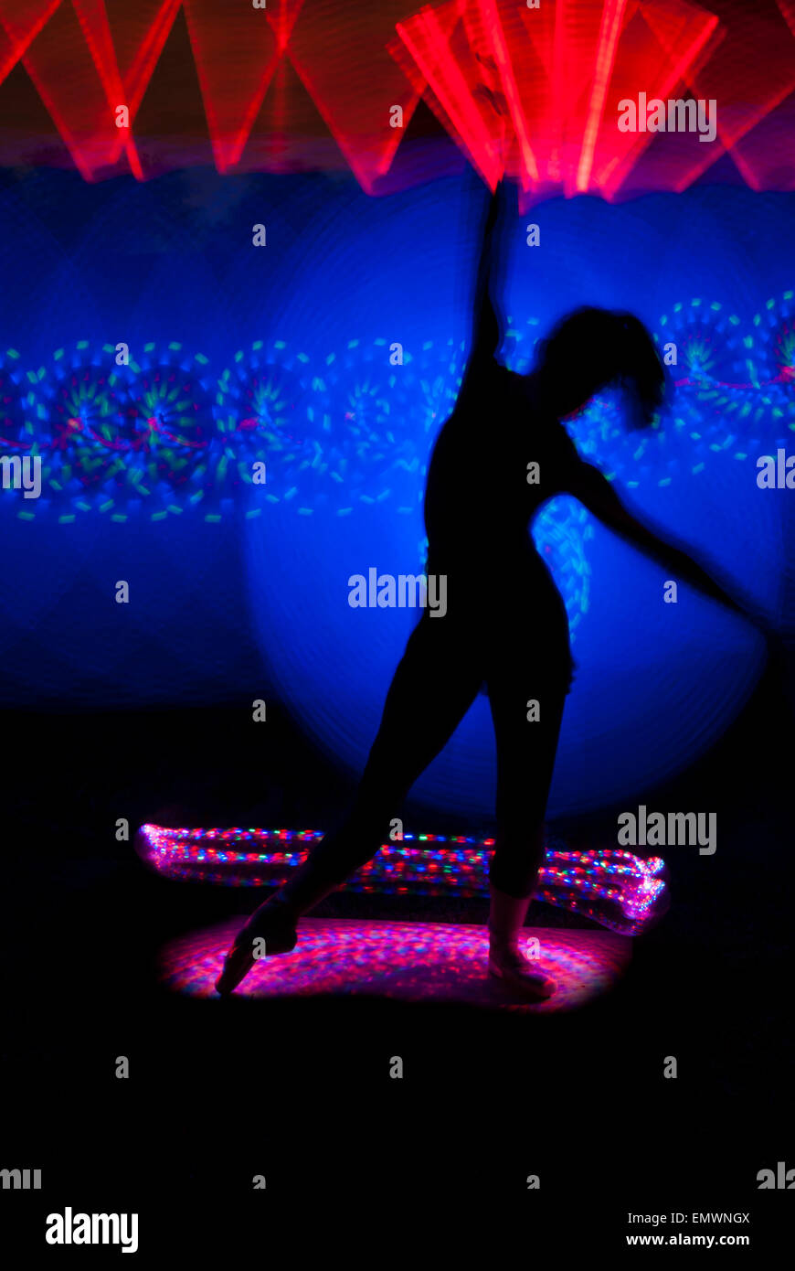 Silhouette girl dancing light painting hi-res stock photography and ...