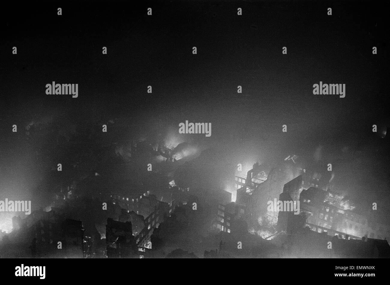 Fires raging around St Paul's Cathedral during the night of bombing on ...