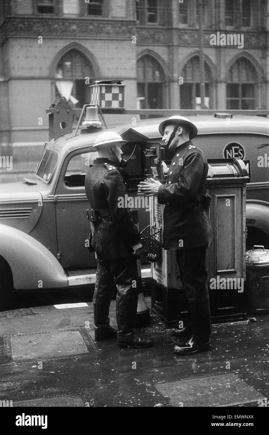 V1 Flying Bomb incident, Staple Inn, Holborn. Two N.F.S men reporting ...