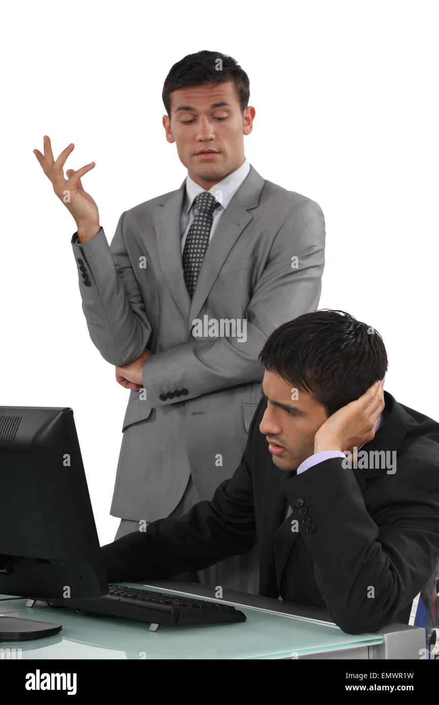 Arrogant businessman talking to his colleague Stock Photo - Alamy