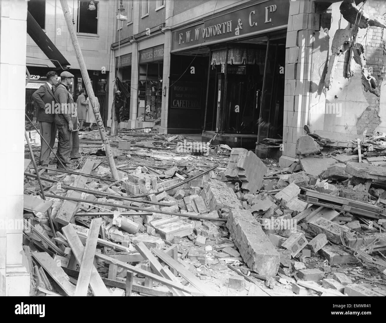 Workers seen here clearing up in Coventry following the air raid of ...
