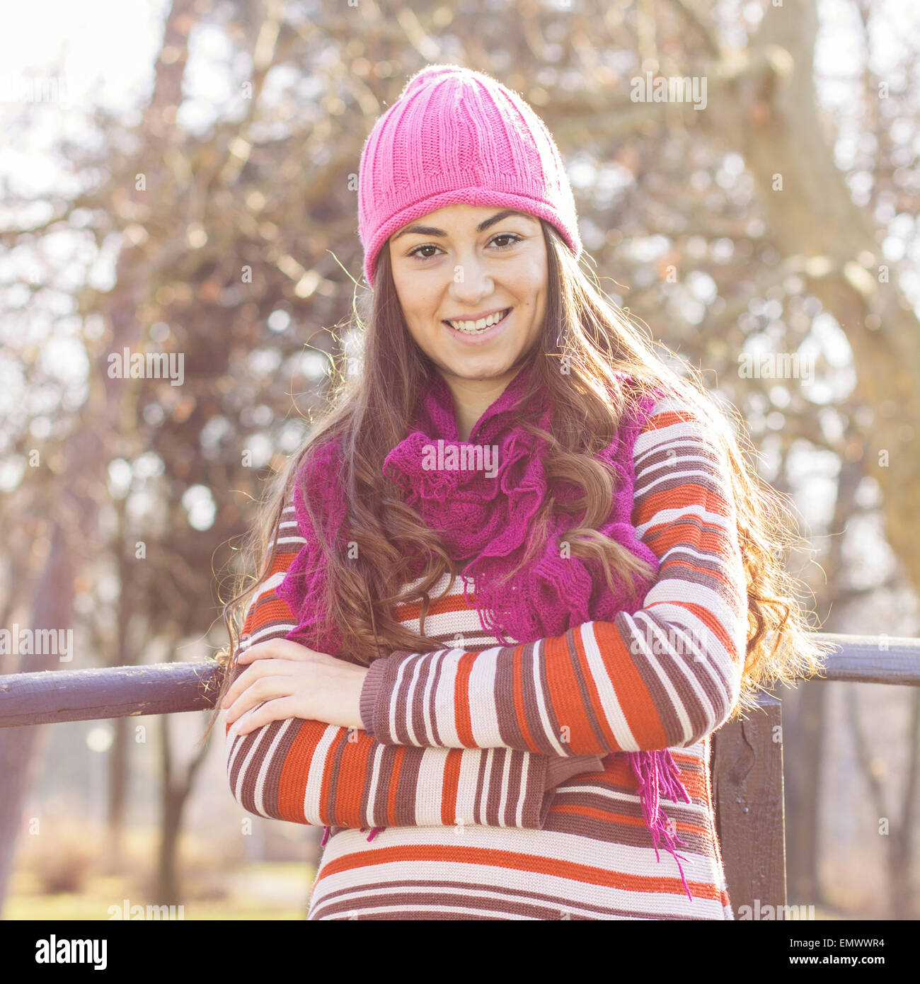 Cheerful Beautiful Lovely Young Woman Relaxing in the park. Autumn or ...