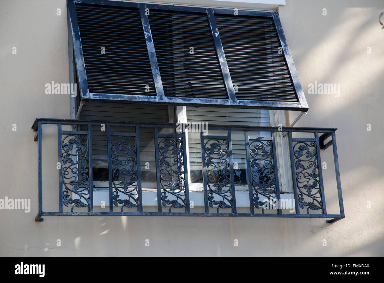 Wrought iron shutters hi-res stock photography and images - Alamy