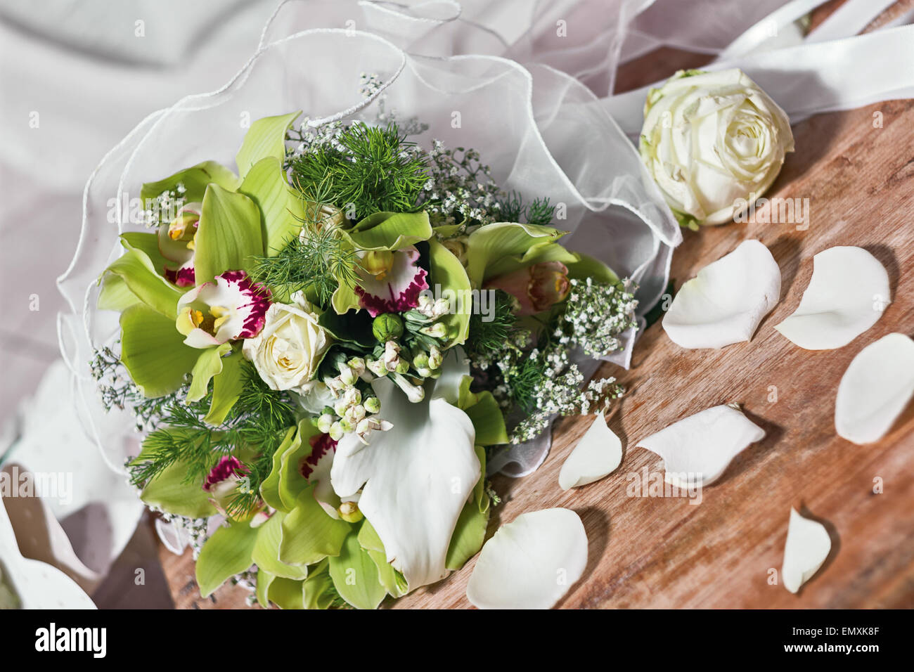 bouquet of flowers on an old wooden base Stock Photo - Alamy