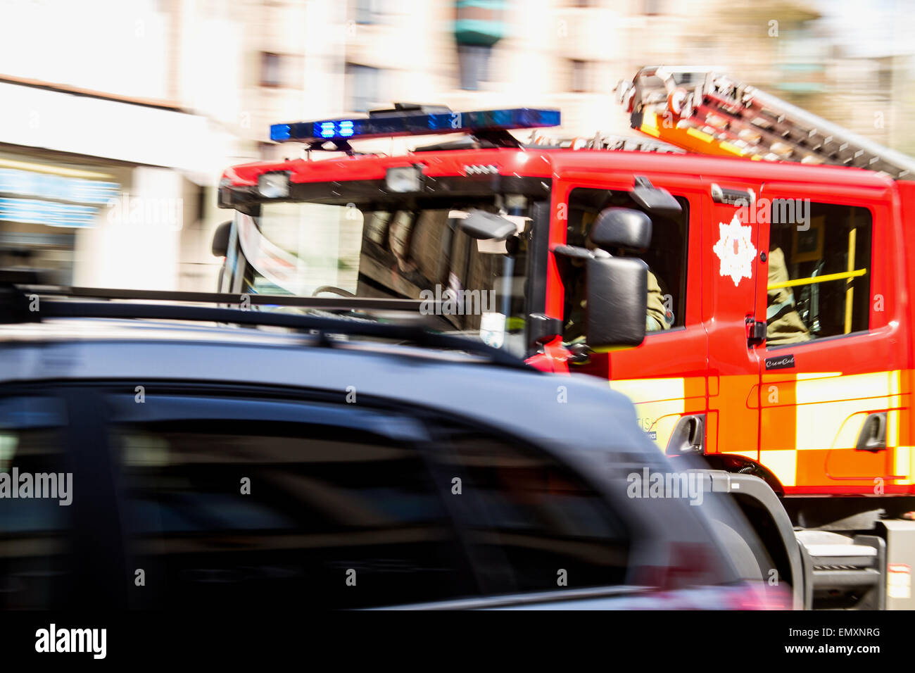 A Scottish Fire and Rescue Service Fire Engine speeding along the ...