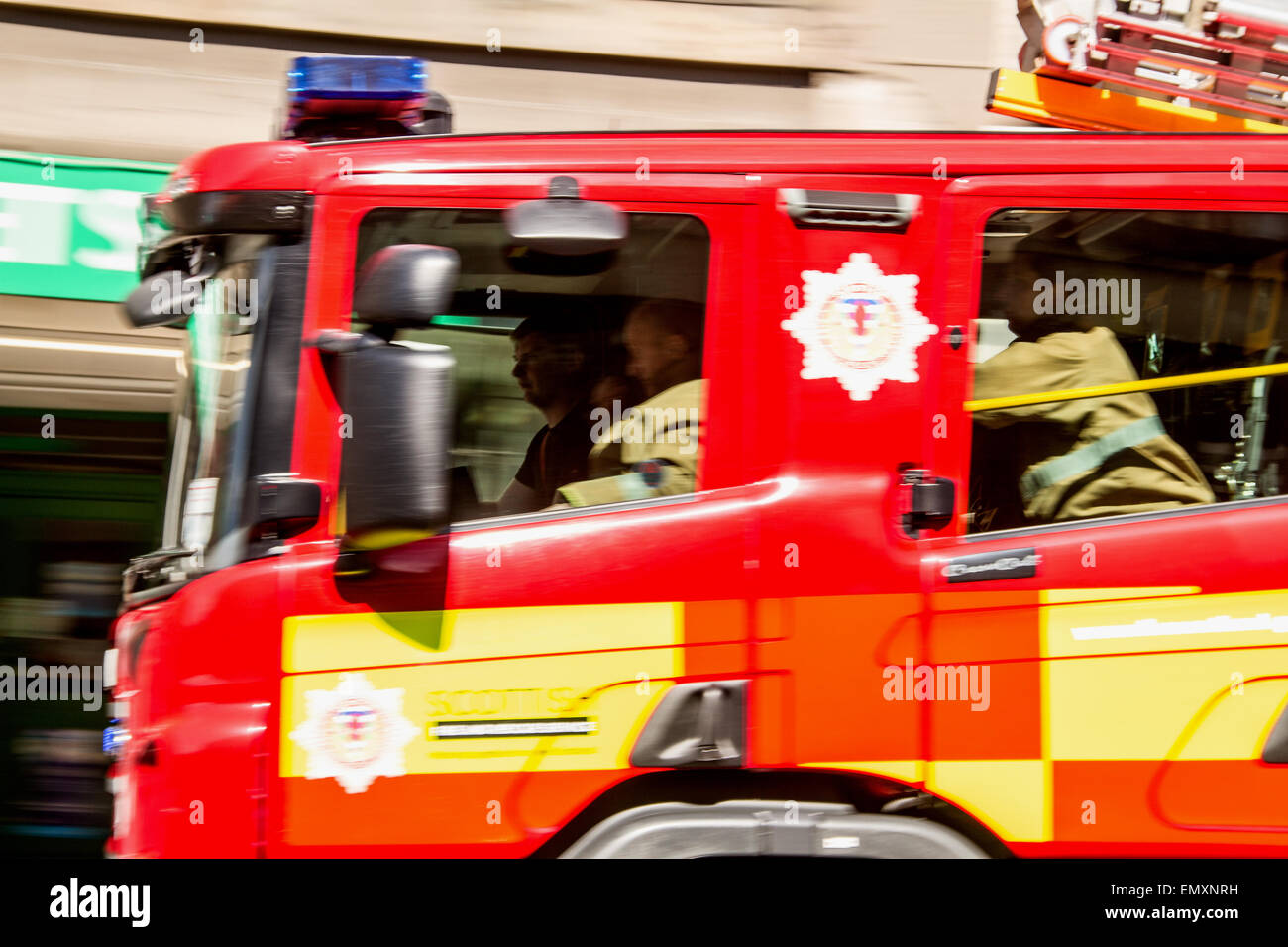 A Scottish Fire and Rescue Service Fire Engine speeding along the ...