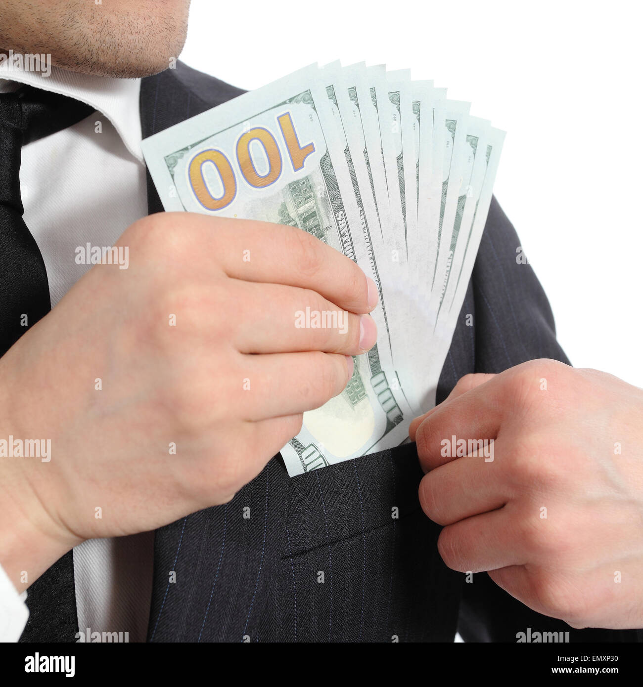 Close up of a business man hand keeping money in his pocket isolated on ...