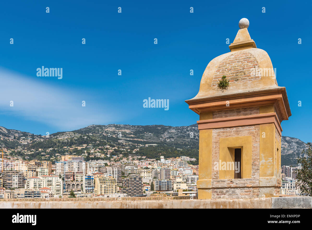 Monaco with a tower and the wall of the old city in the foreground ...