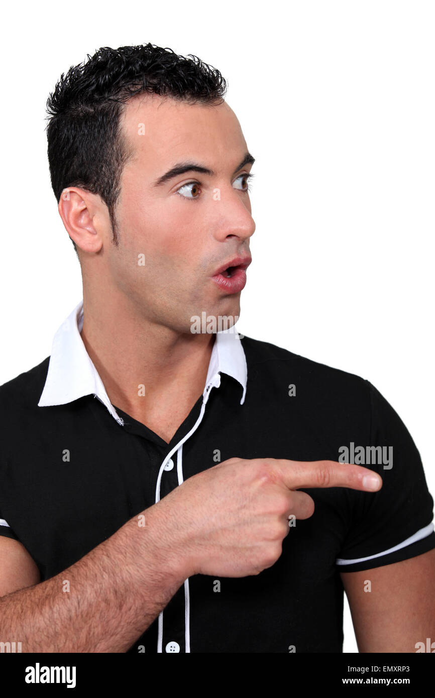 Man pointing in surprise Stock Photo - Alamy