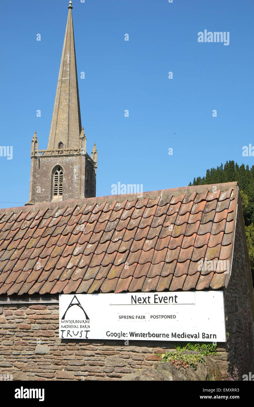 Next event sign for Winterbourne Medieval barn with parish church ...