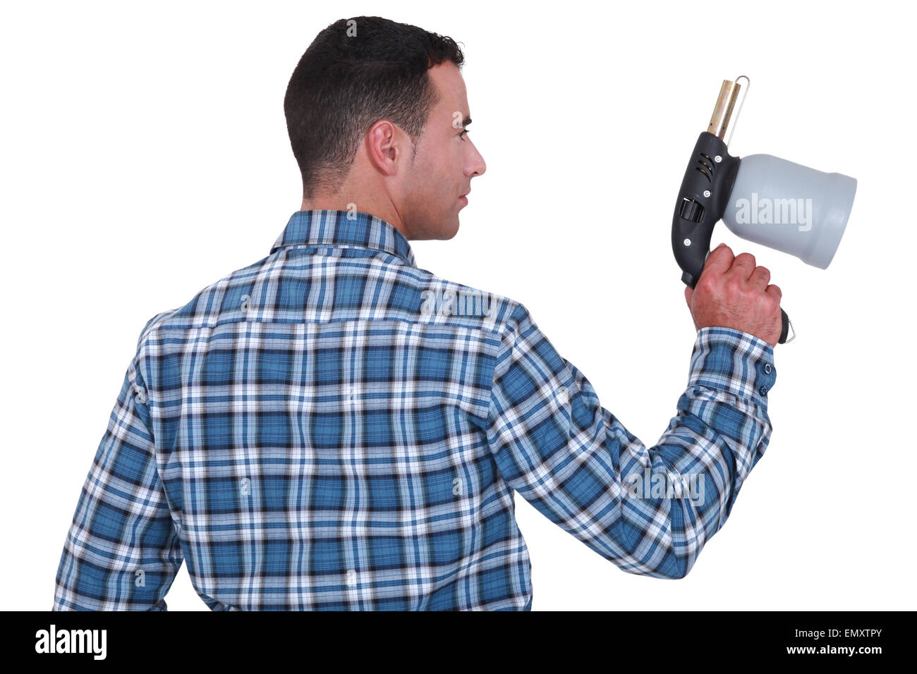Man holding a spray gun Stock Photo - Alamy