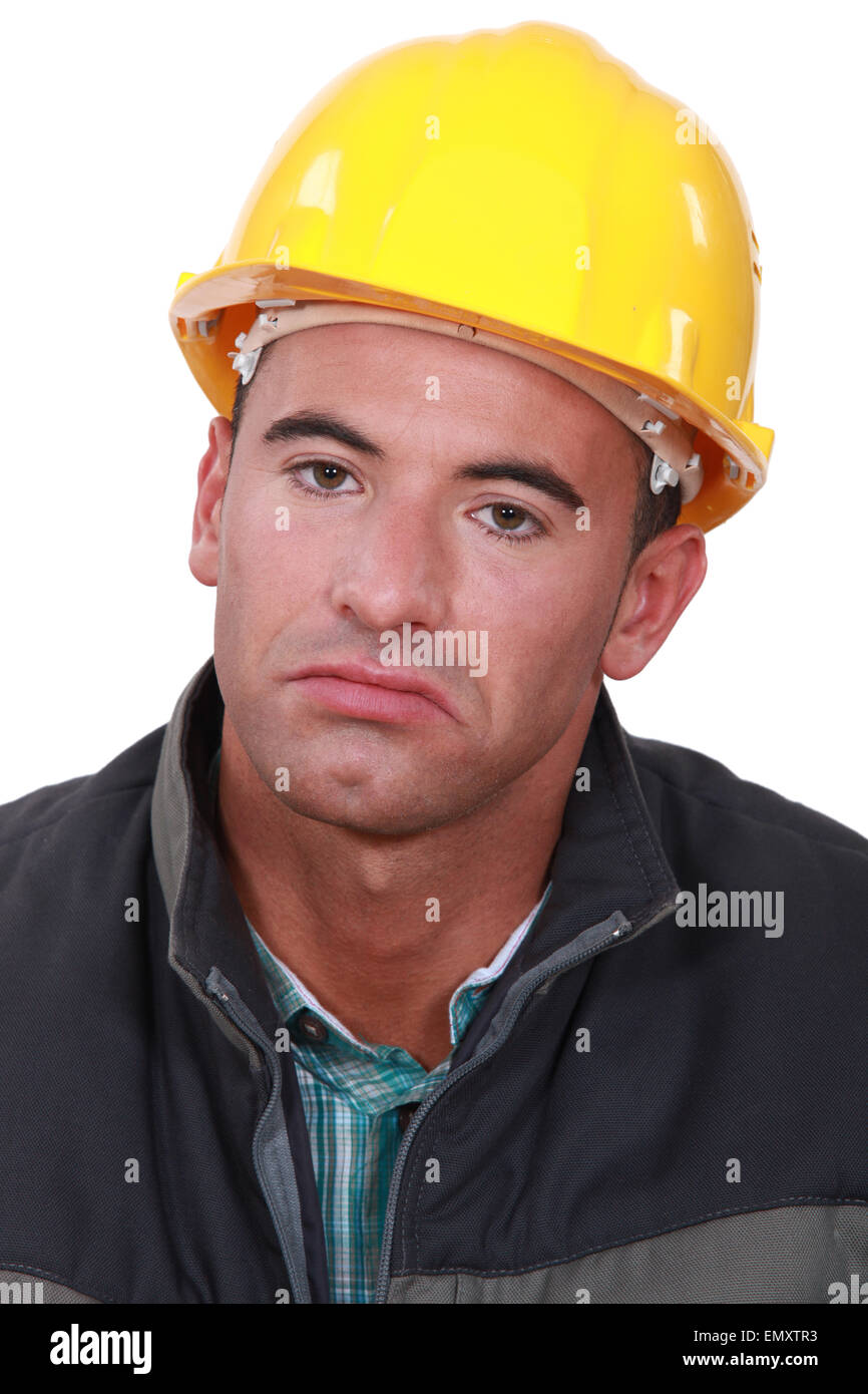 Grumpy manual worker Stock Photo - Alamy