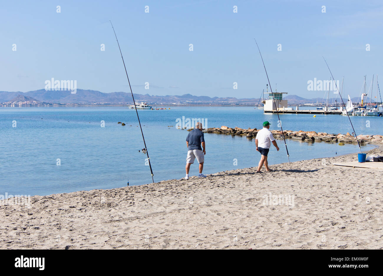 Two men beach fishing in the Mar Menor Los Alcazares Spain Stock Photo ...
