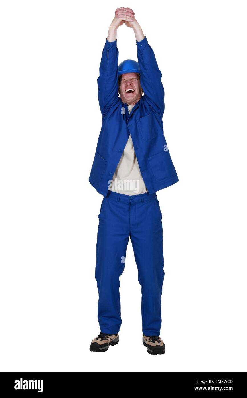 Construction worker hanging Stock Photo - Alamy