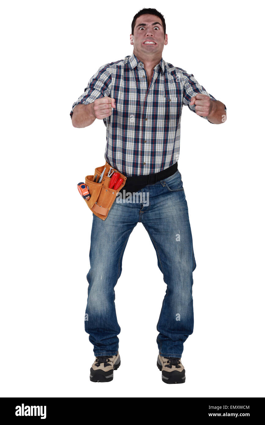 craftsman looking furious Stock Photo - Alamy