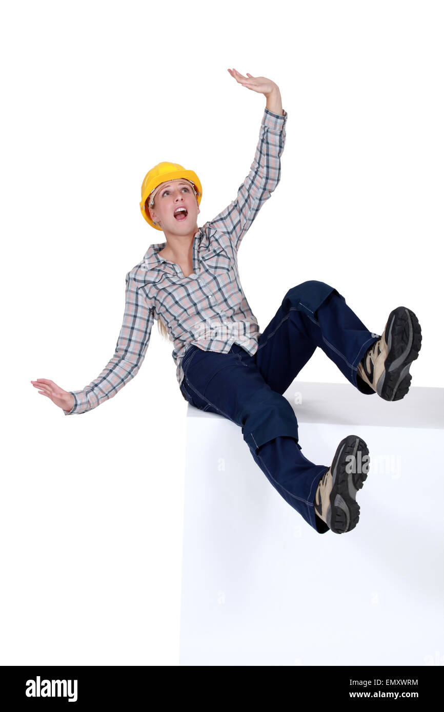 Craftswoman falling down Stock Photo - Alamy