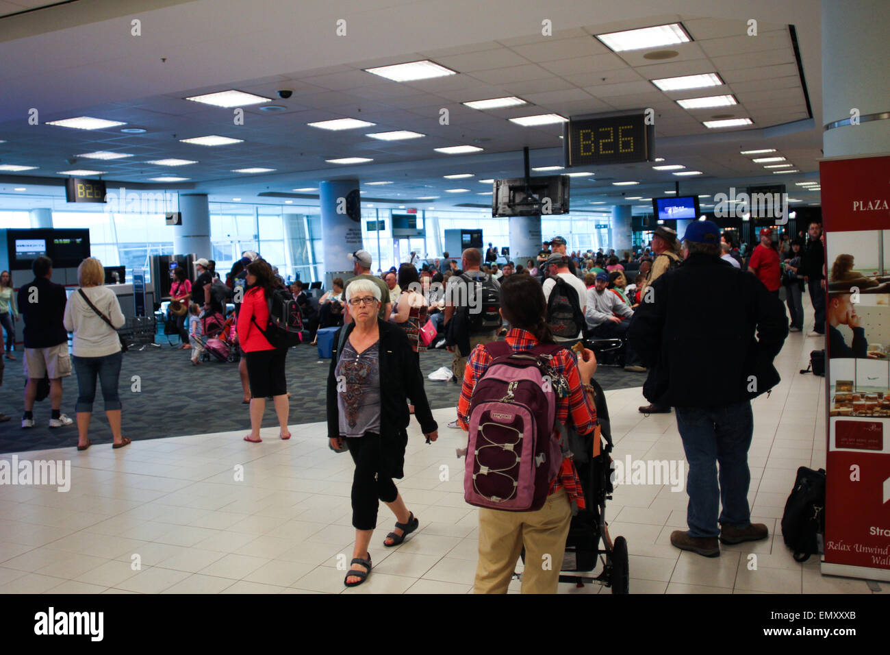 Passengers wait to board a Westjet aircraft at Pearson International ... Passengers wait to board a Westjet aircraft at Pearson International ...