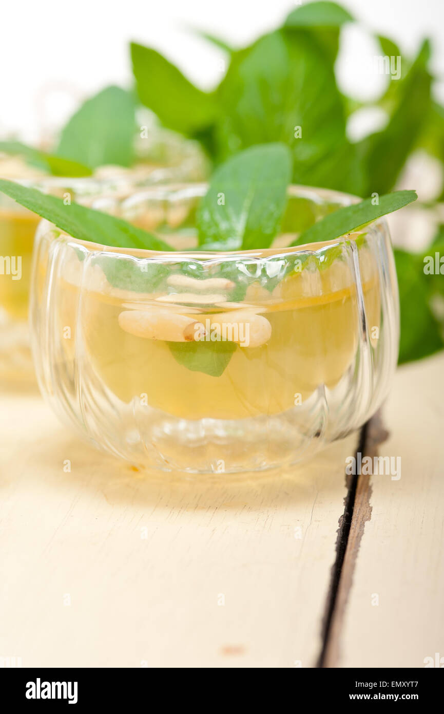 Arab traditional style mint and pine nuts tea called at tay Stock Photo ...