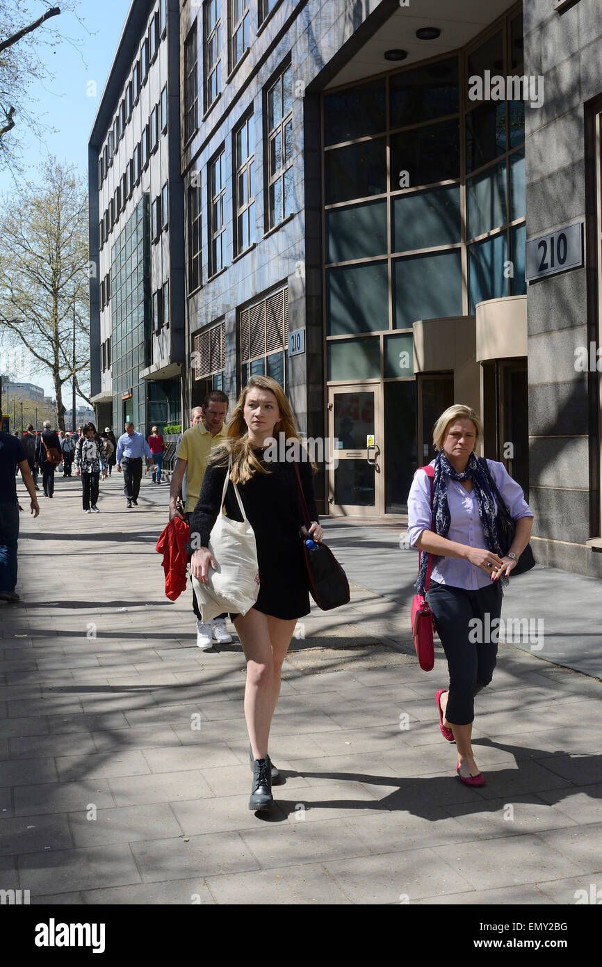 young woman & older woman walking on pavement in London Stock Photo - Alamy