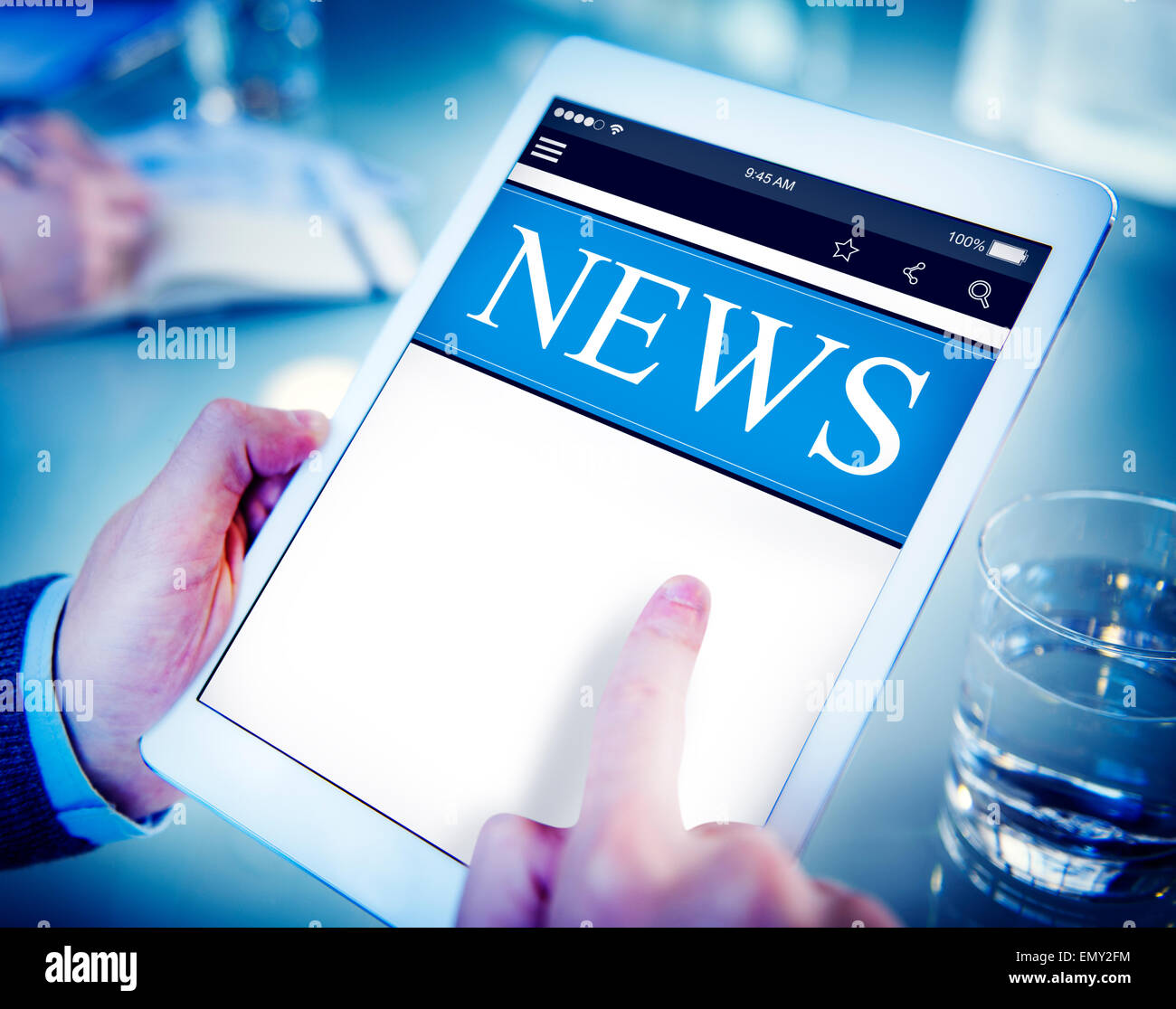 Reading news tablet hi-res stock photography and images - Alamy