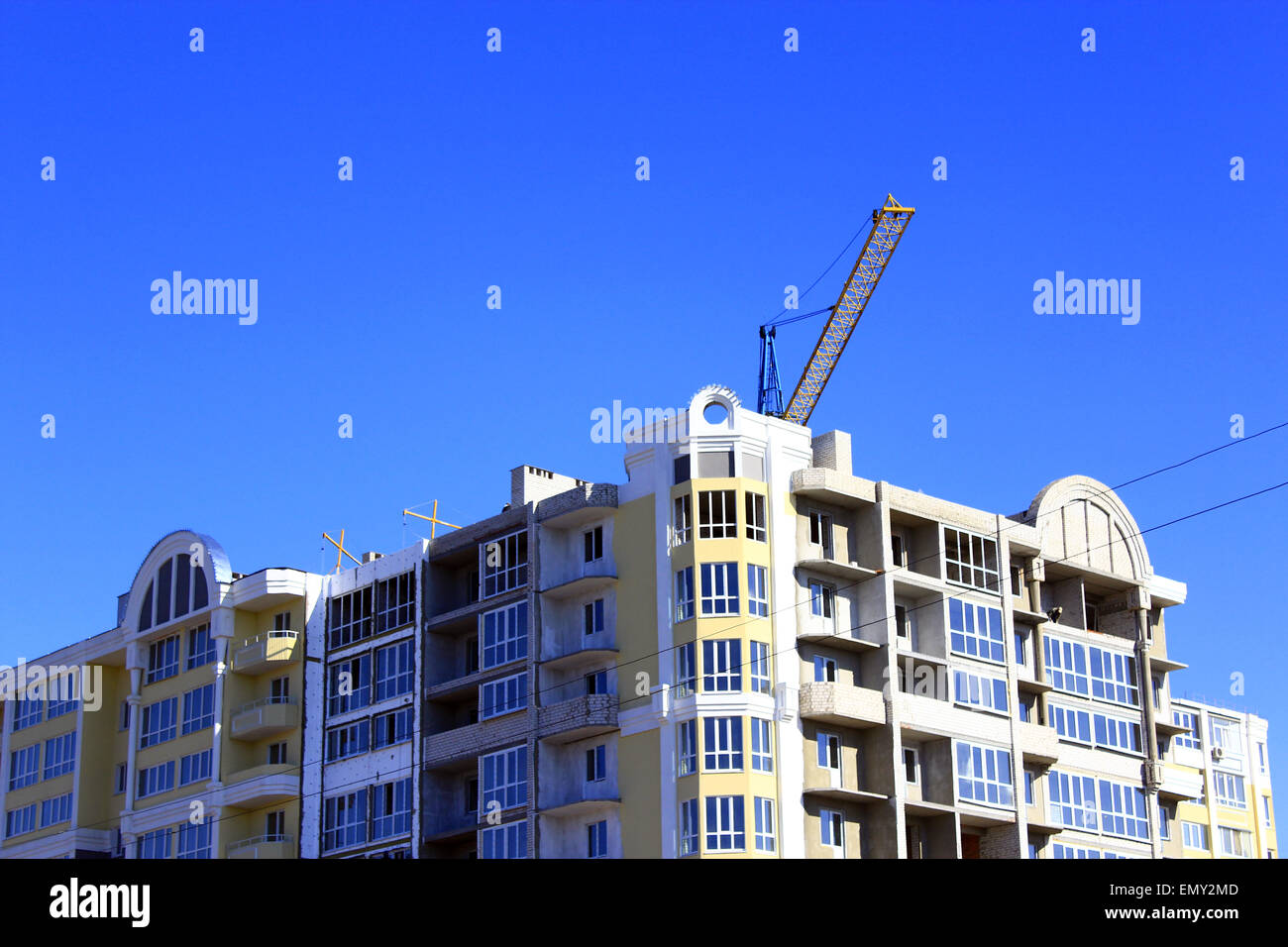 Crane lifting house hi-res stock photography and images - Alamy