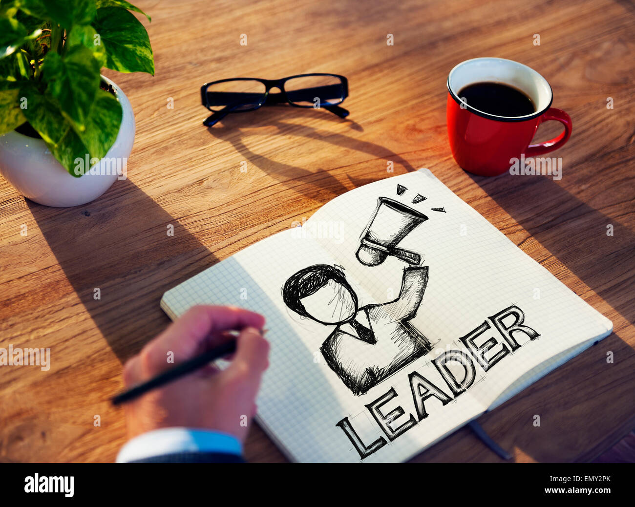 Man with Note Pad and Leadership Concepts Stock Photo - Alamy