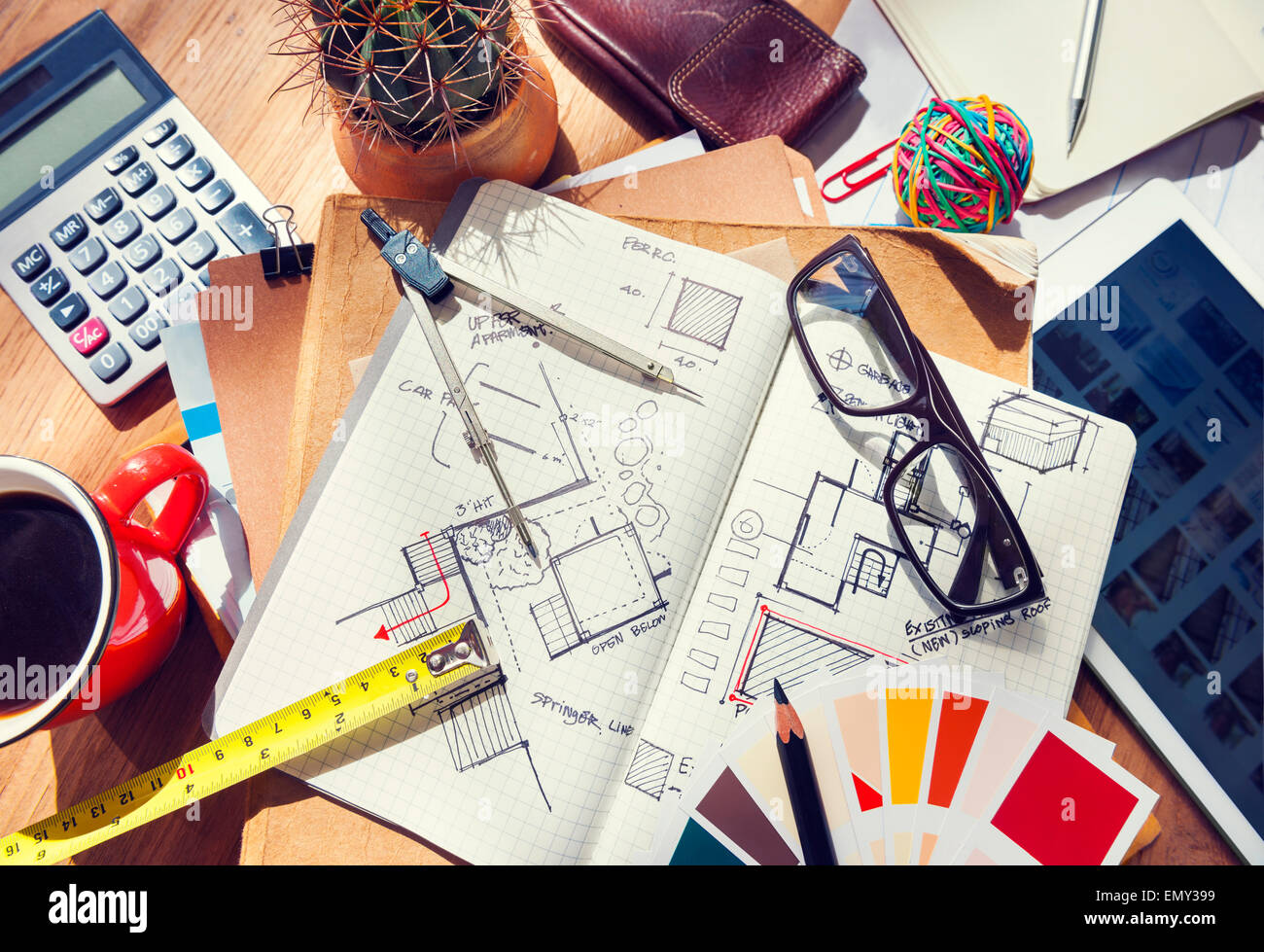 Messy Designer's Table with Sketch and Tools Stock Photo - Alamy