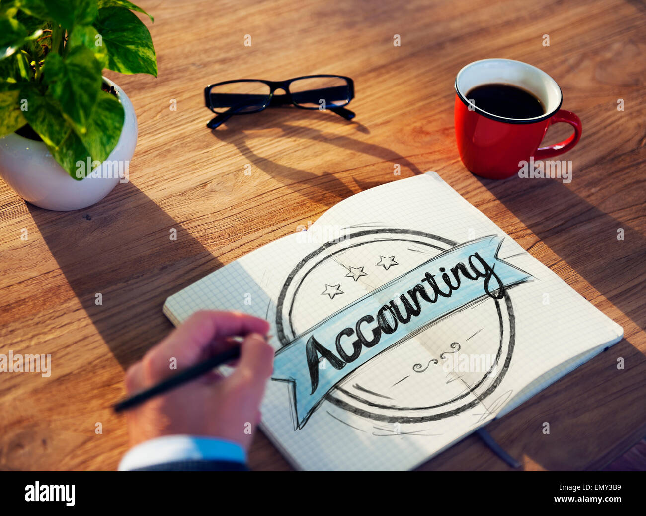 Businessman Writing the Word "Accounting Stock Photo - Alamy