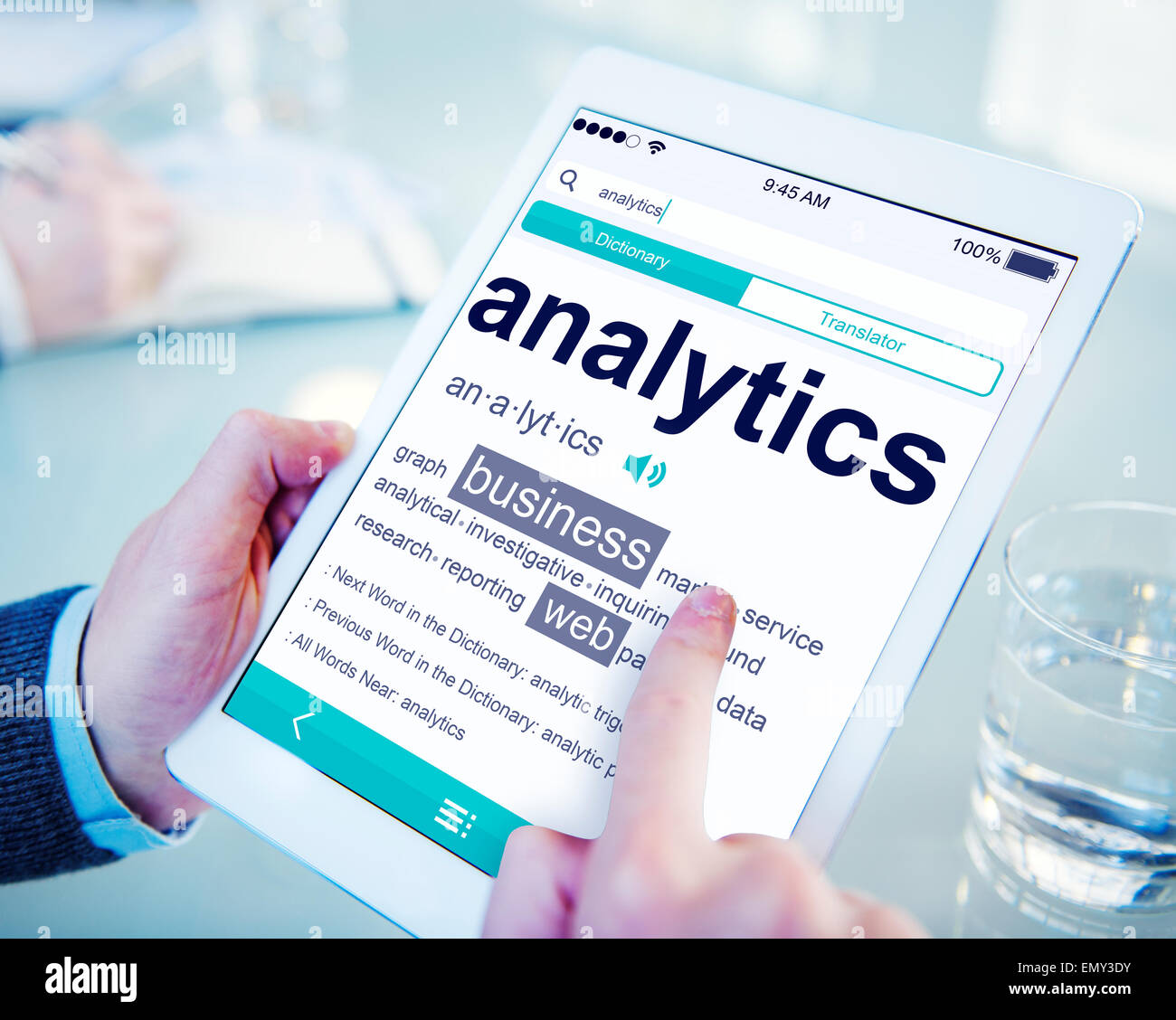 Man Reading the Definition of Analytics Stock Photo - Alamy