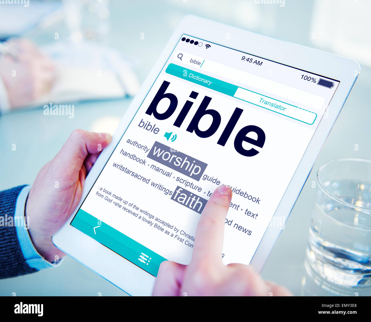 Man Reading the Definition of Bible Stock Photo - Alamy