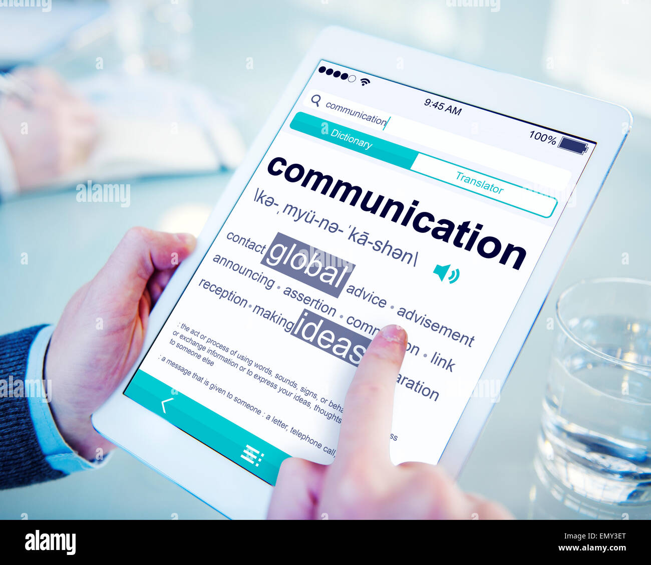 Man Reading the Definition of Communication Stock Photo - Alamy