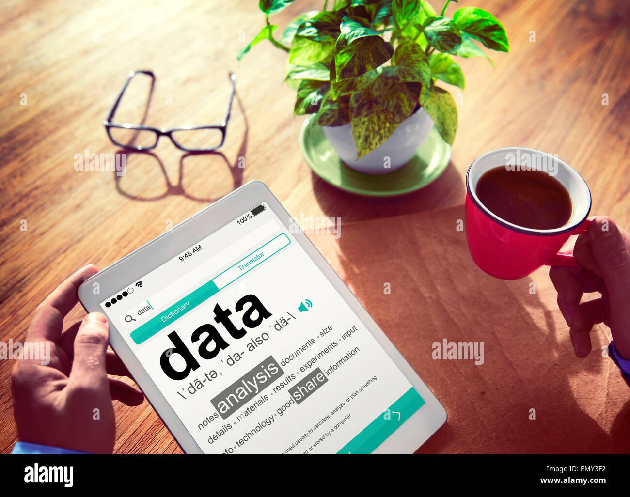 Man Reading the Definition of Data Stock Photo - Alamy